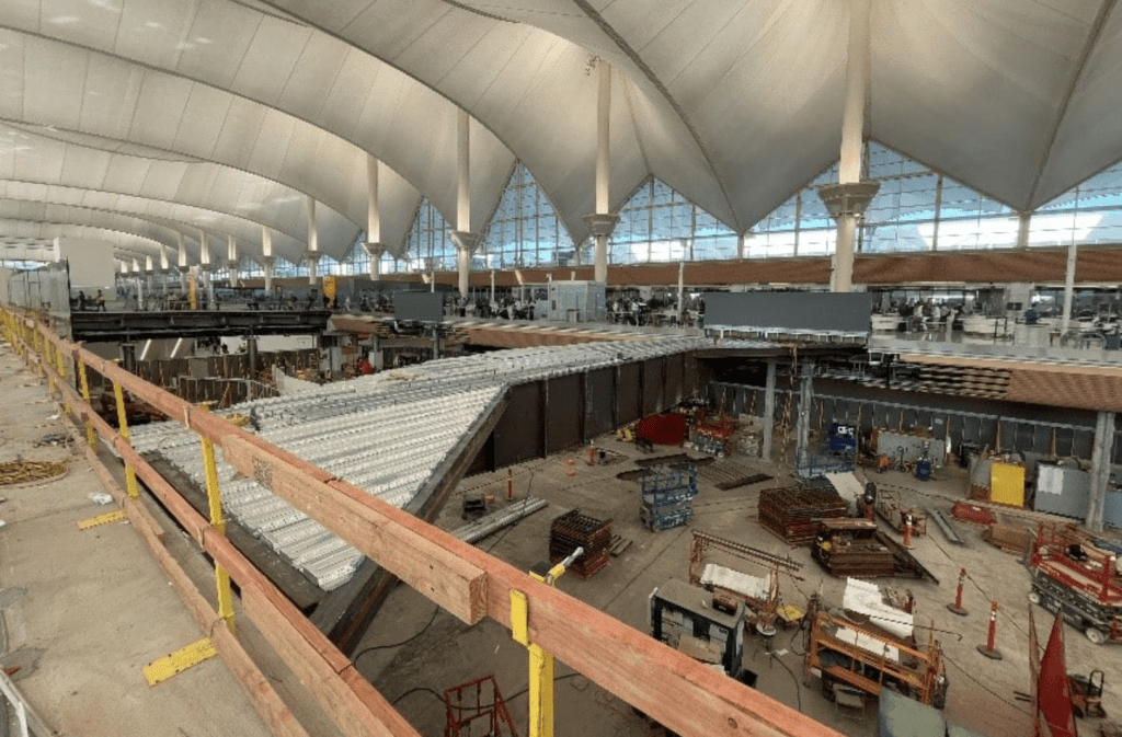 DEN Celebrates 50% Completion of New East Security Checkpoint - Mile ...