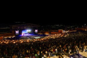 VENU Closes $49.7M Sale-Leaseback on Ford Amphitheater Land - Mile High CRE